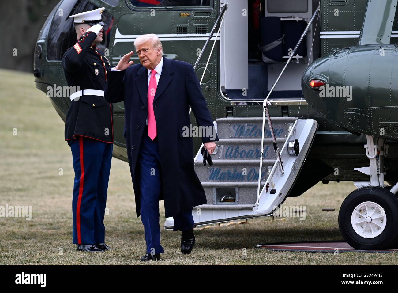 President Donald Trump walks from Marine One at the White House after ...