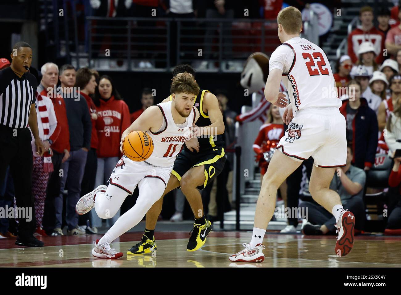 February 22, 2025: Wisconsin Badgers guard Max Klesmit (11) dribbles ...