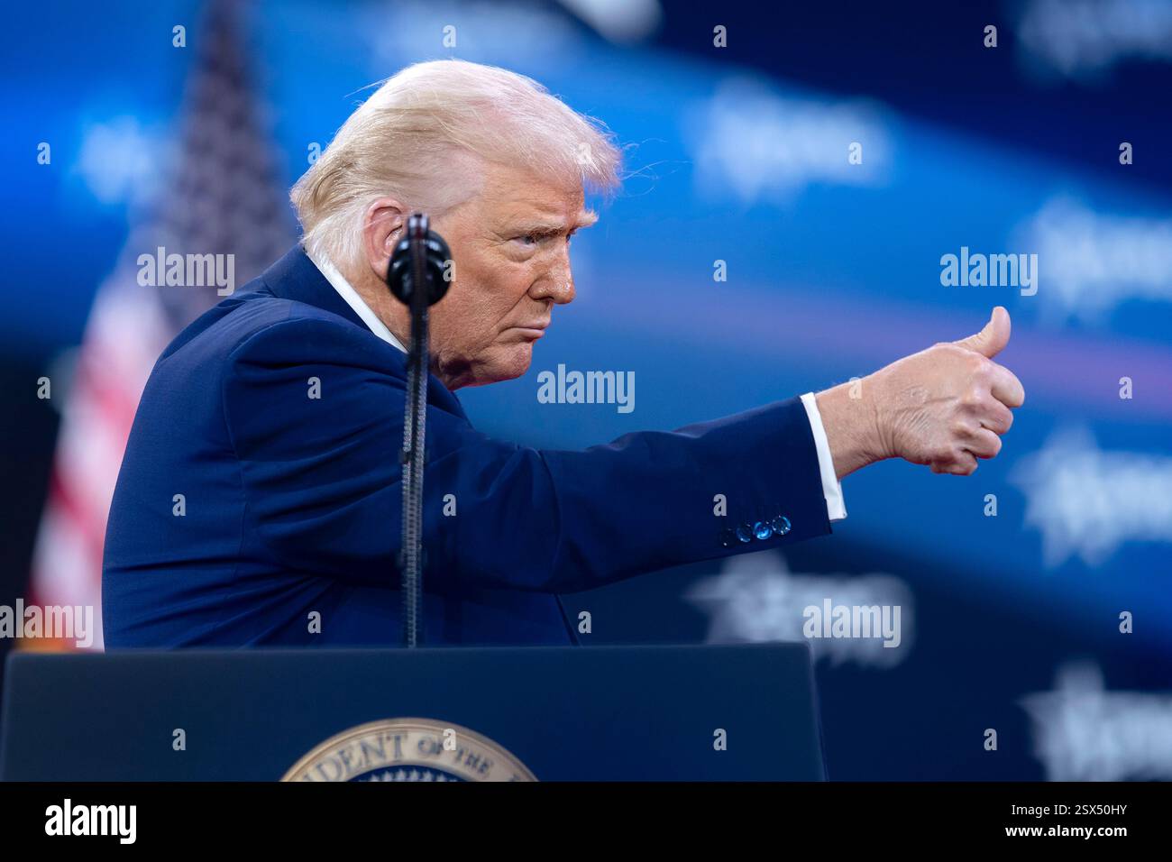 President Donald Trump gives a thumbs-up as he speaks at the Conservative Political Action ...