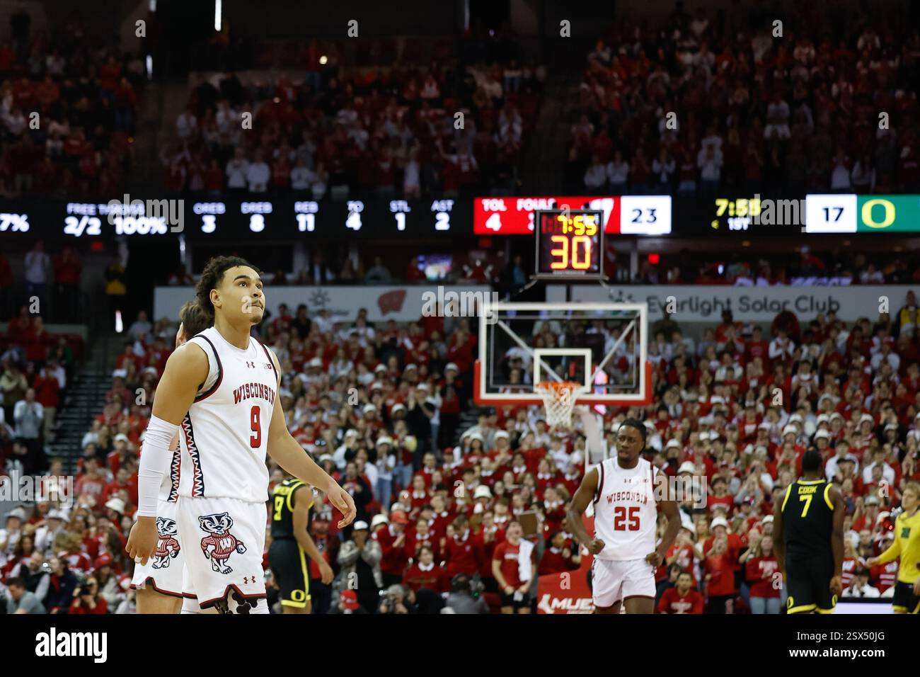 Madison, WI, USA. 22nd Feb, 2025. Wisconsin Badgers guard John Tonje (9 ...