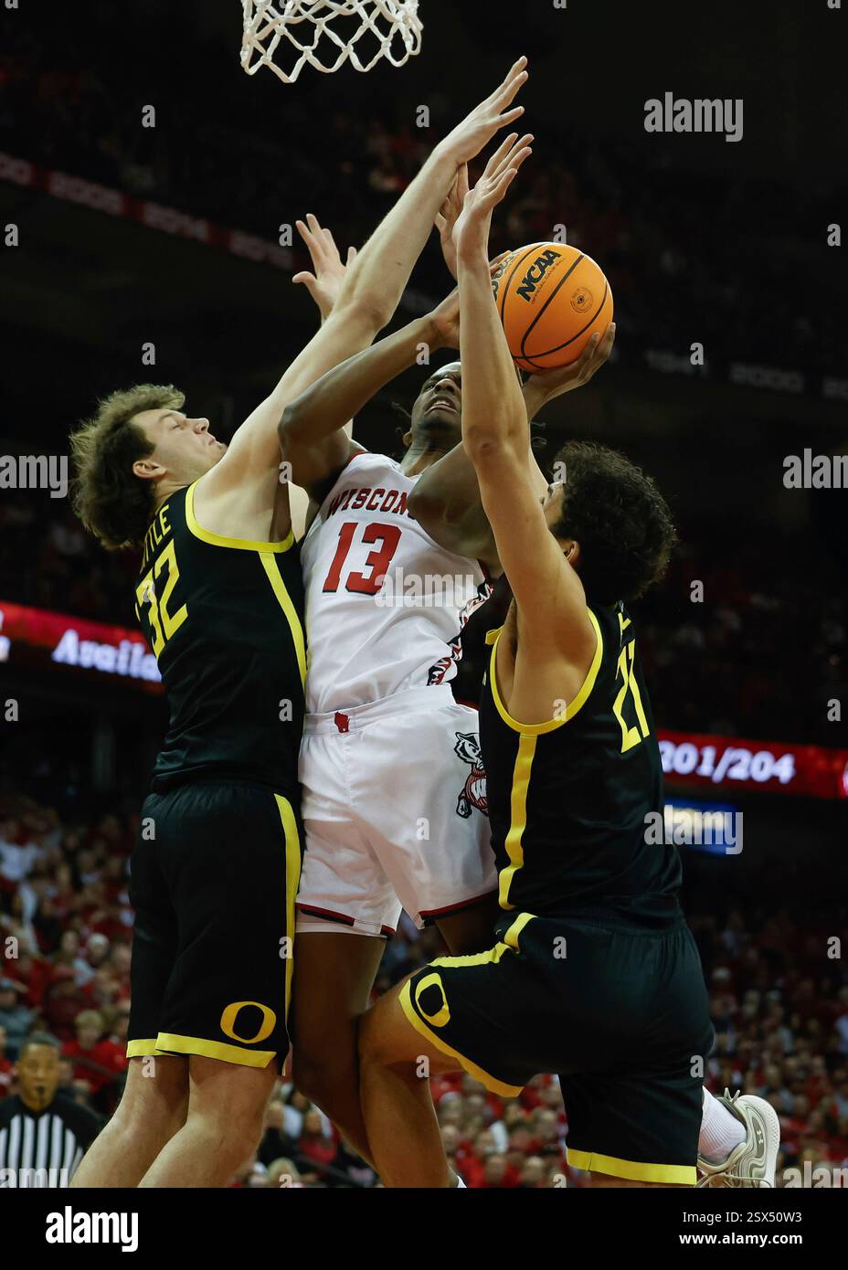February 22, 2025: Wisconsin Badgers forward Xavier Amos (13) attempts ...