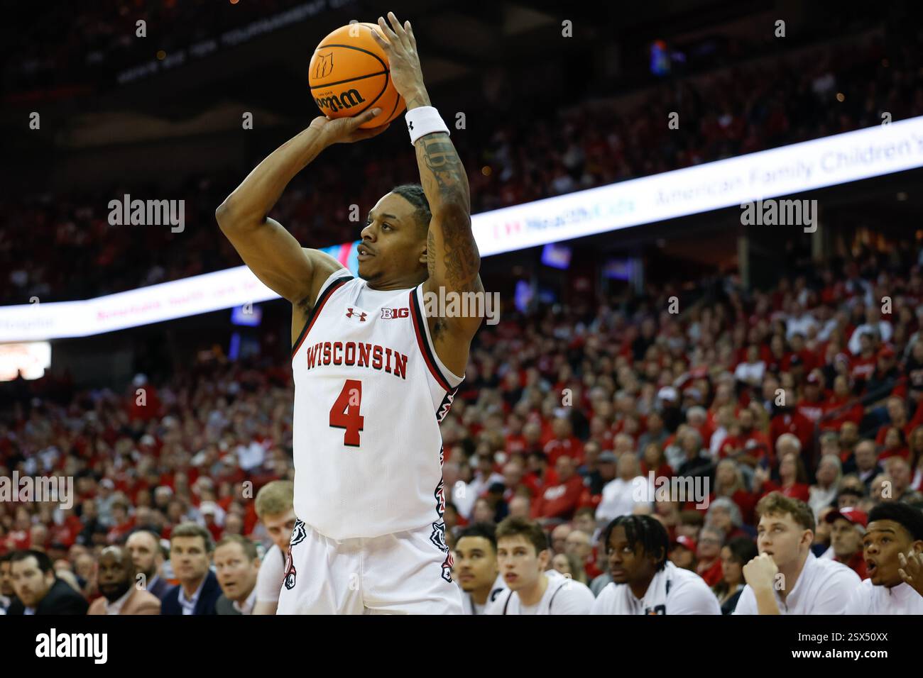 Madison, WI, USA. 22nd Feb, 2025. Wisconsin Badgers guard Kamari McGee ...
