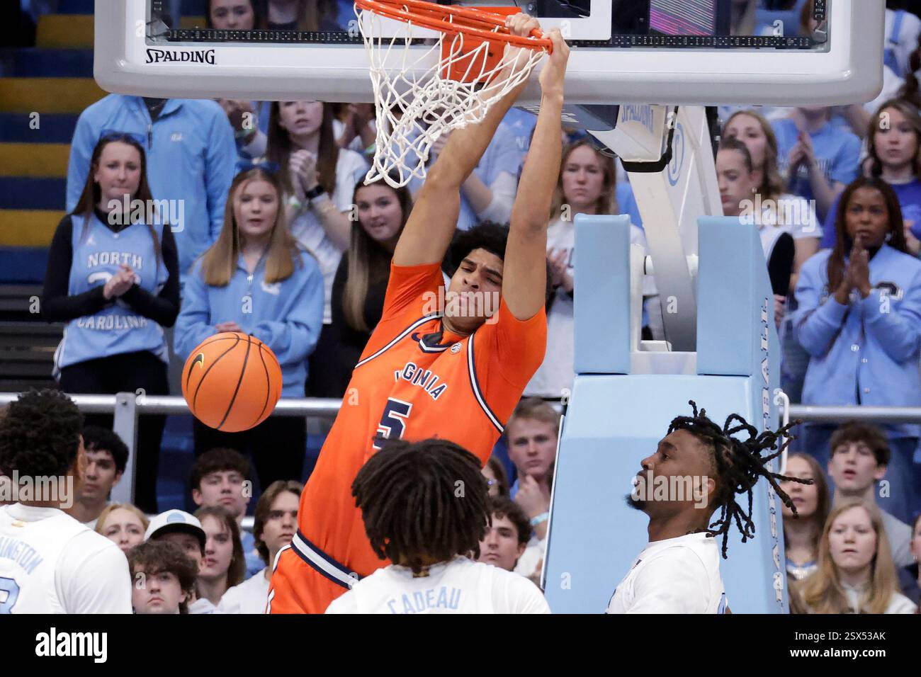 Virginia forward Jacob Cofie (5) dunks during the first half of an NCAA ...