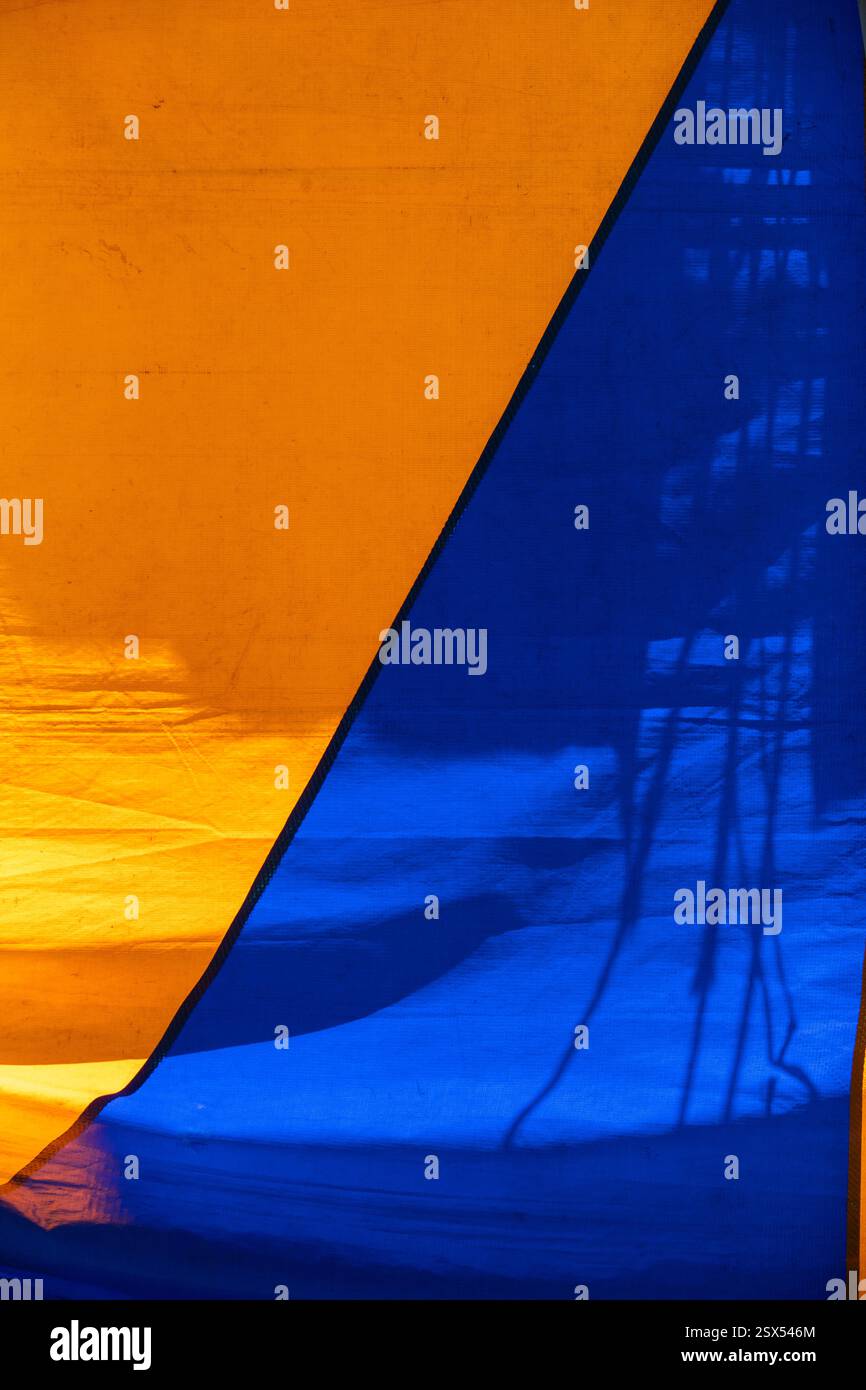 Colorful texture of old circus tent forming blue and yellow geometric ...