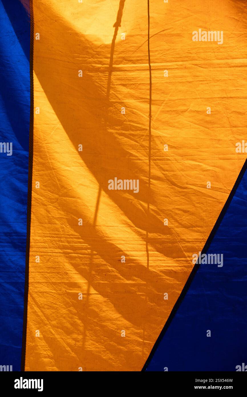 Colorful texture of old circus tent forming blue and yellow geometric ...