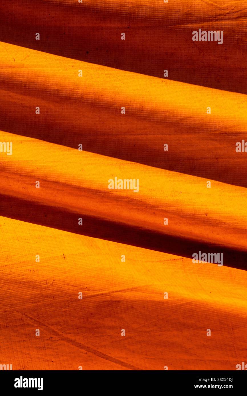 Colorful texture of old circus tent forming yellow and oranges graphic ...