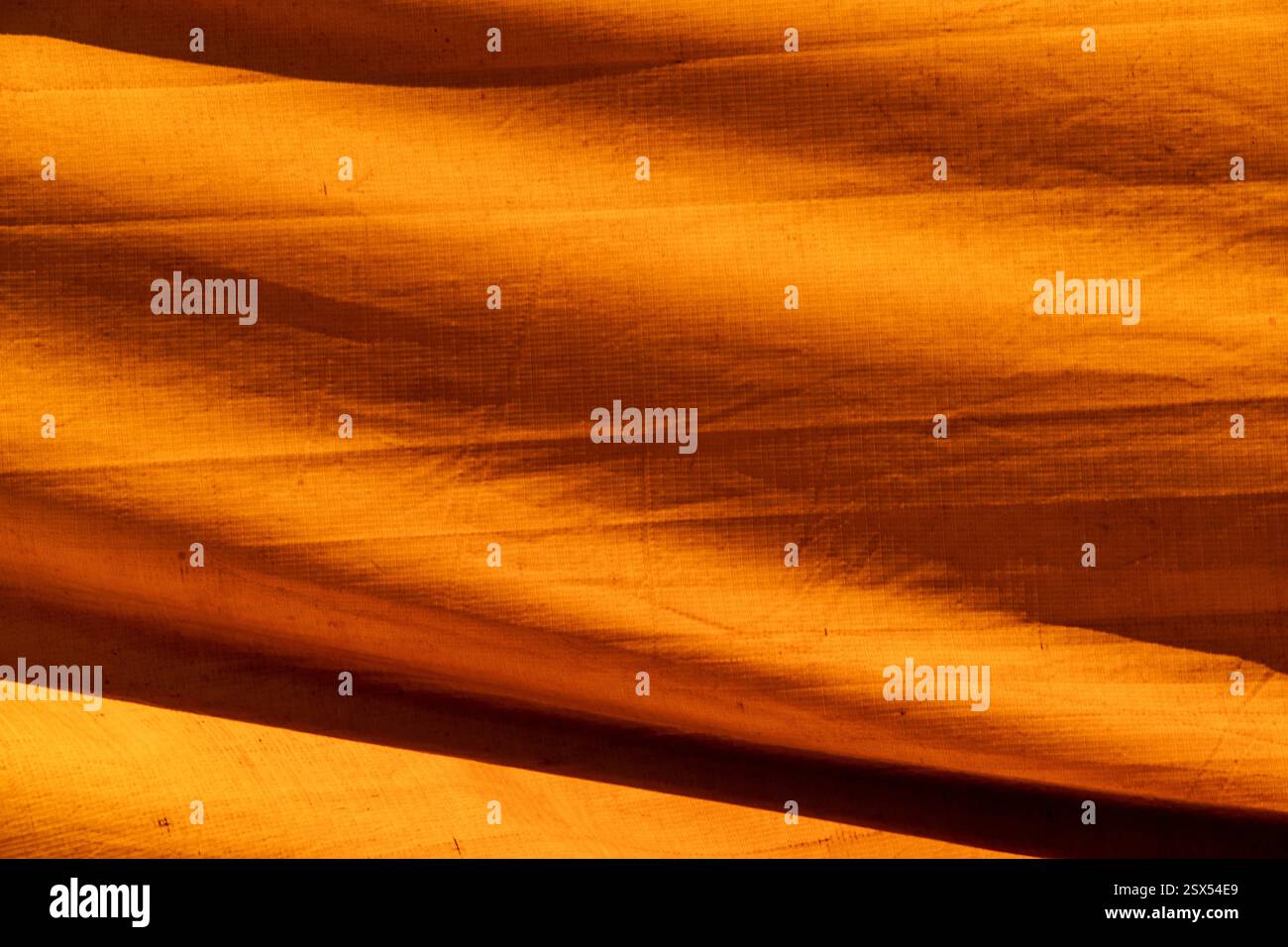 Colorful texture of old circus tent forming yellow and oranges graphic ...