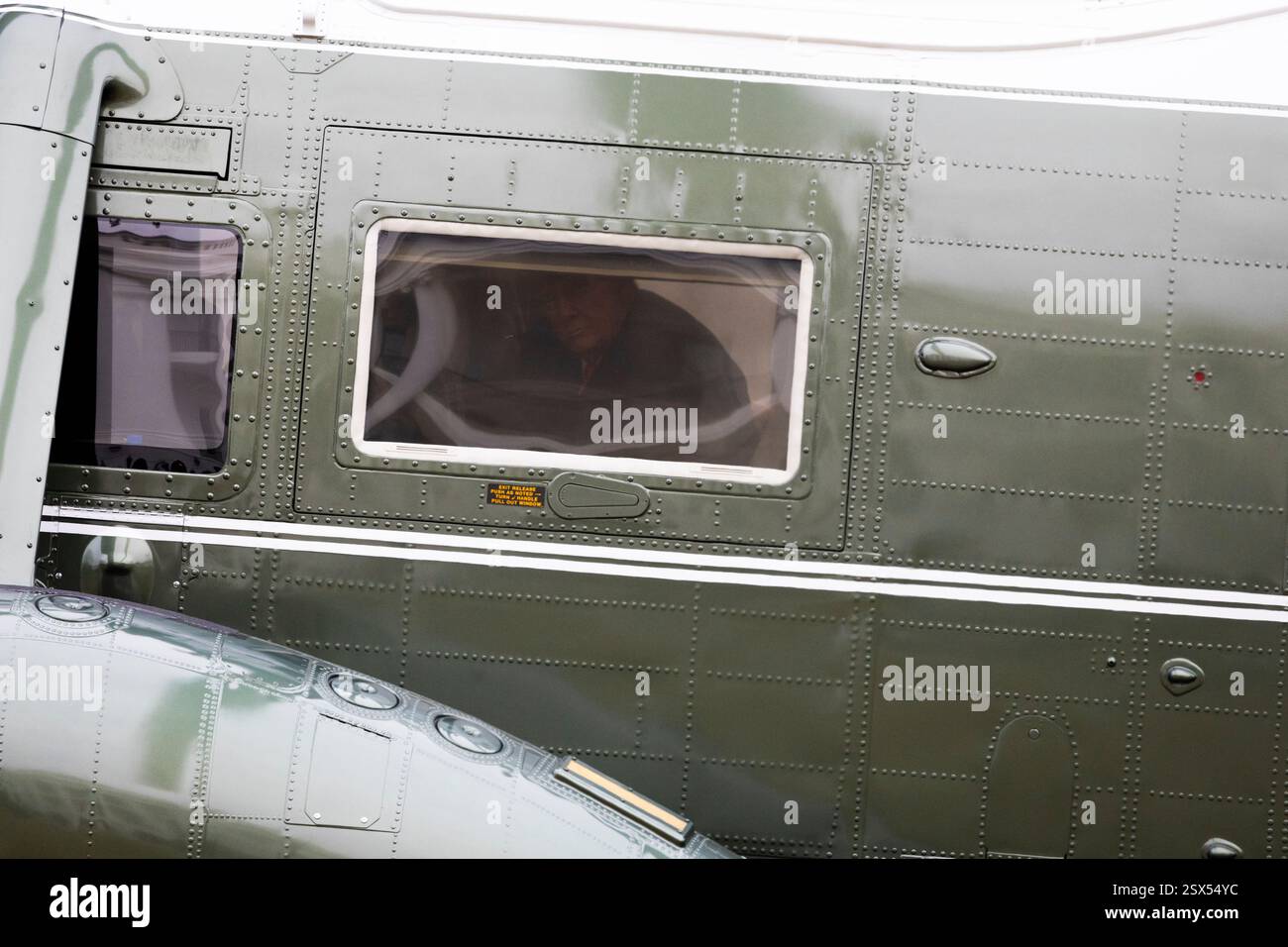 WASHINGTON – February 22, 2025: President Donald Trump peers out the ...
