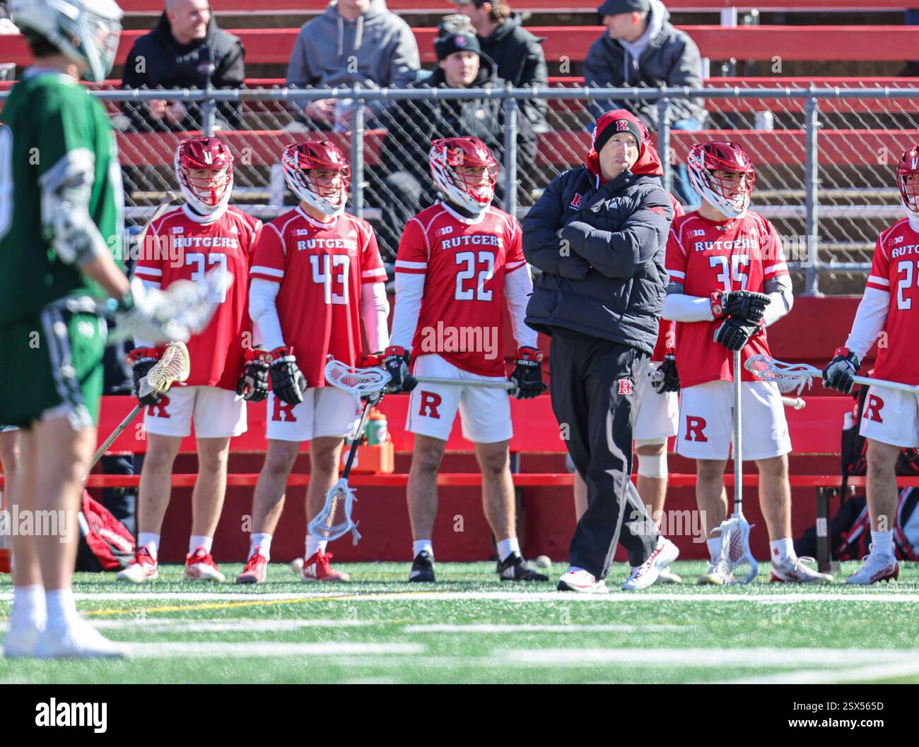 February 22, 2025: Rutgers head coach Brian Brecht looks on during an ...