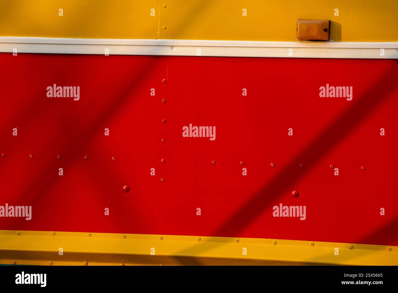Abstract colorful shape on the metallic wall of an old bus. texture ...