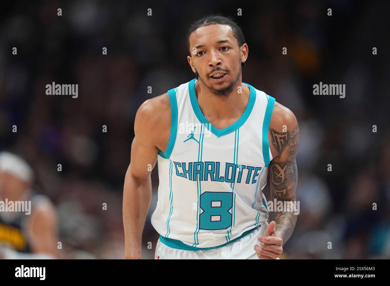 Charlotte Hornets guard Nick Smith Jr. (8) in the first half of an NBA basketball game Thursday ...