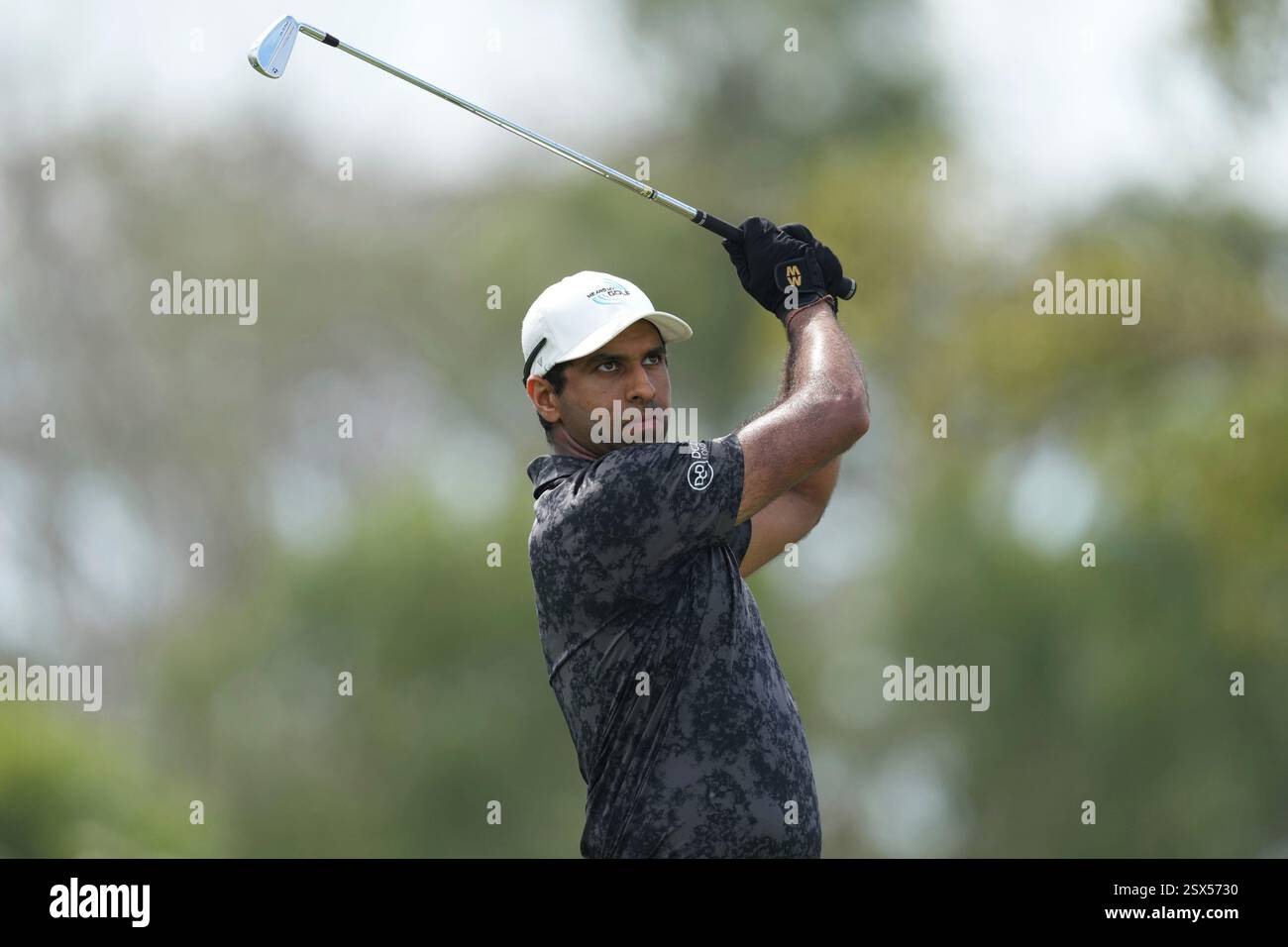 CORRECTS NAME OF GOLFER - Aaron Rai, of England, watches his tee shot ...
