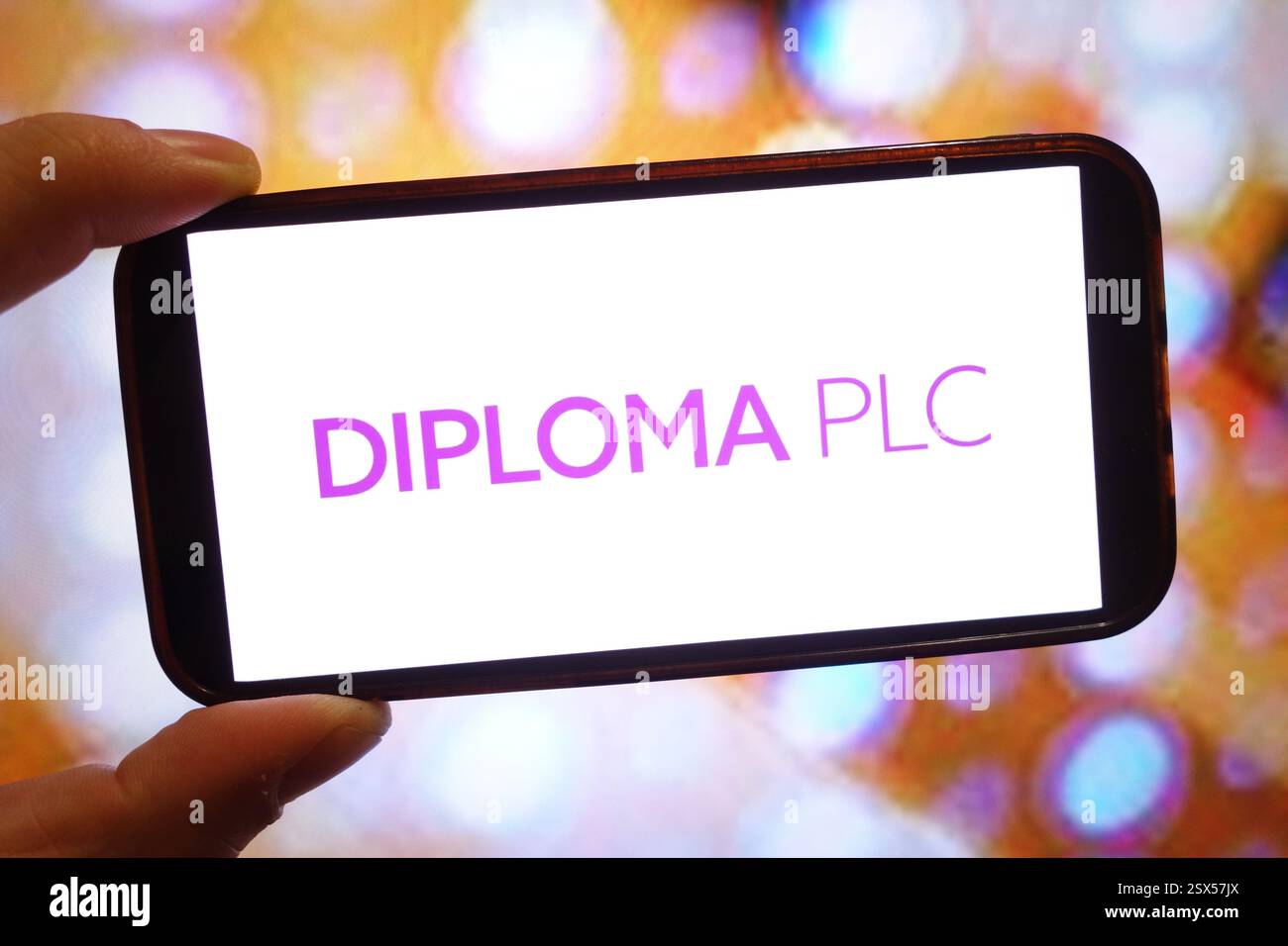 In this photo illustration, the Diploma plc company logo is seen ...