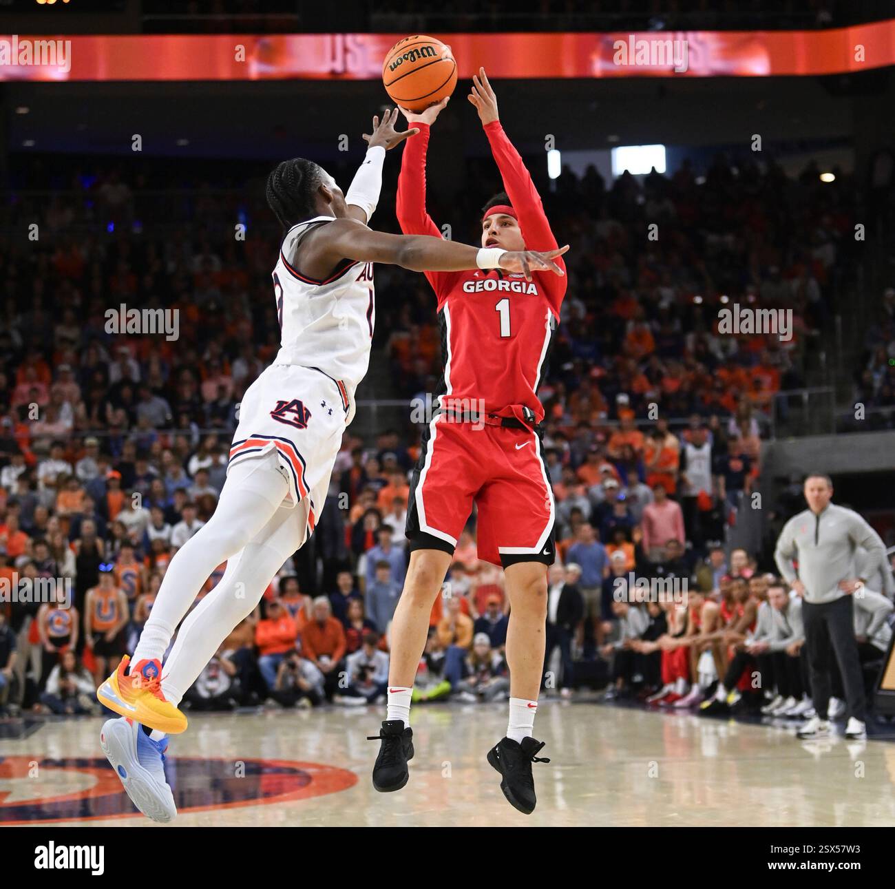Auburn guard Miles Kelly (13) defends a shot by Georgia guard Dakota ...