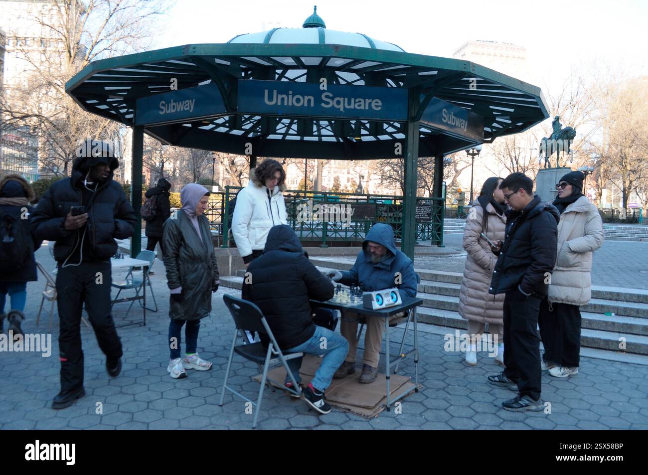 People play chess at a table in Union Square, Manhattan, New York City ...