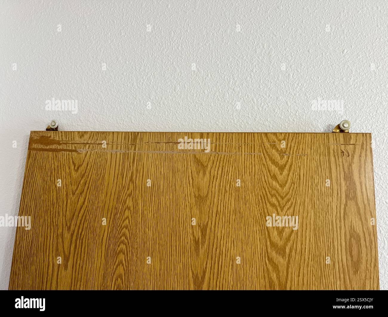 Damaged Wooden Cabinet Door with Peeling Finish Stock Photo - Alamy