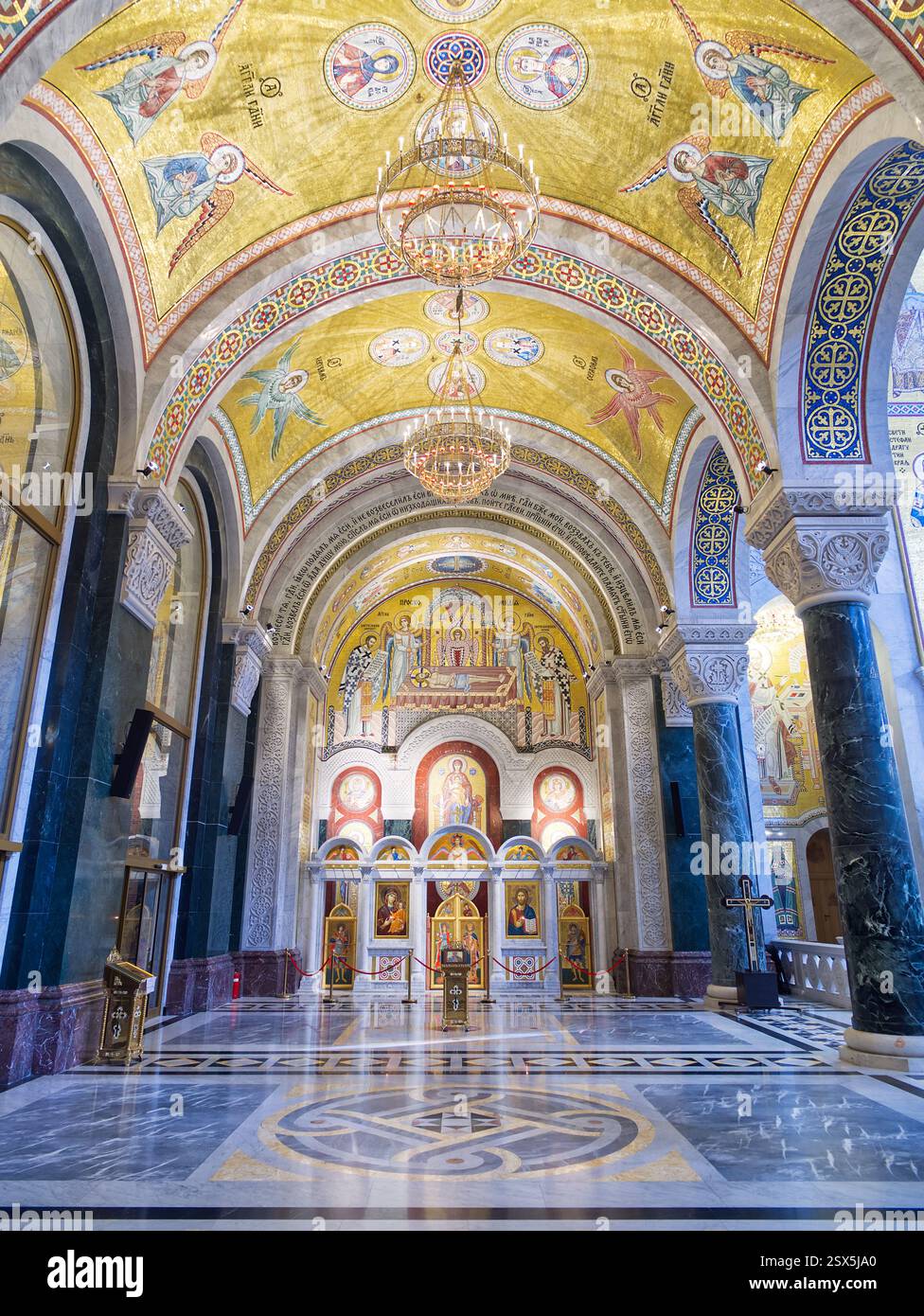 Luxurious church interior with golden mosaics, arched ceilings ...