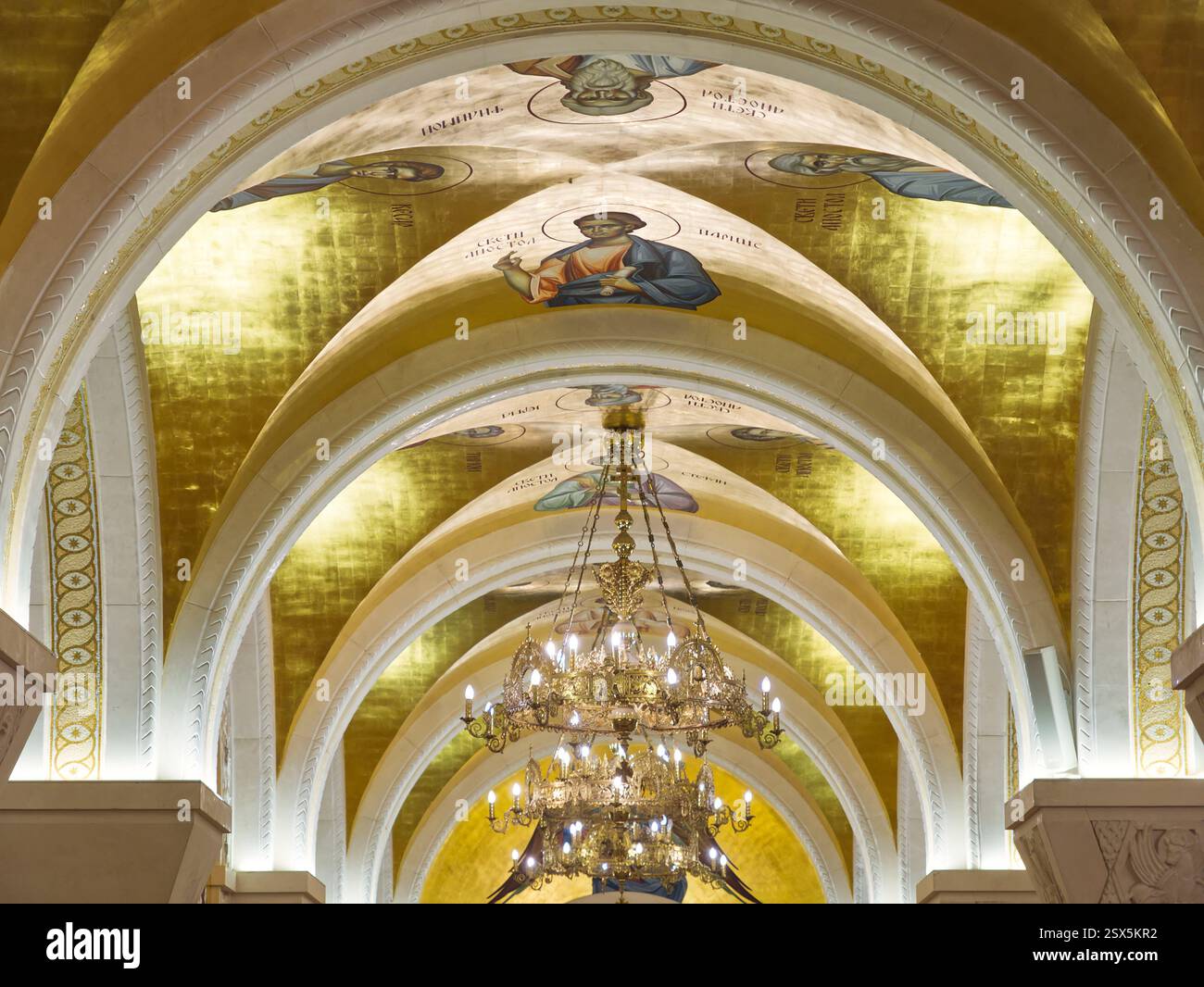 Elaborate vaulted ceiling with religious iconography, golden accents ...