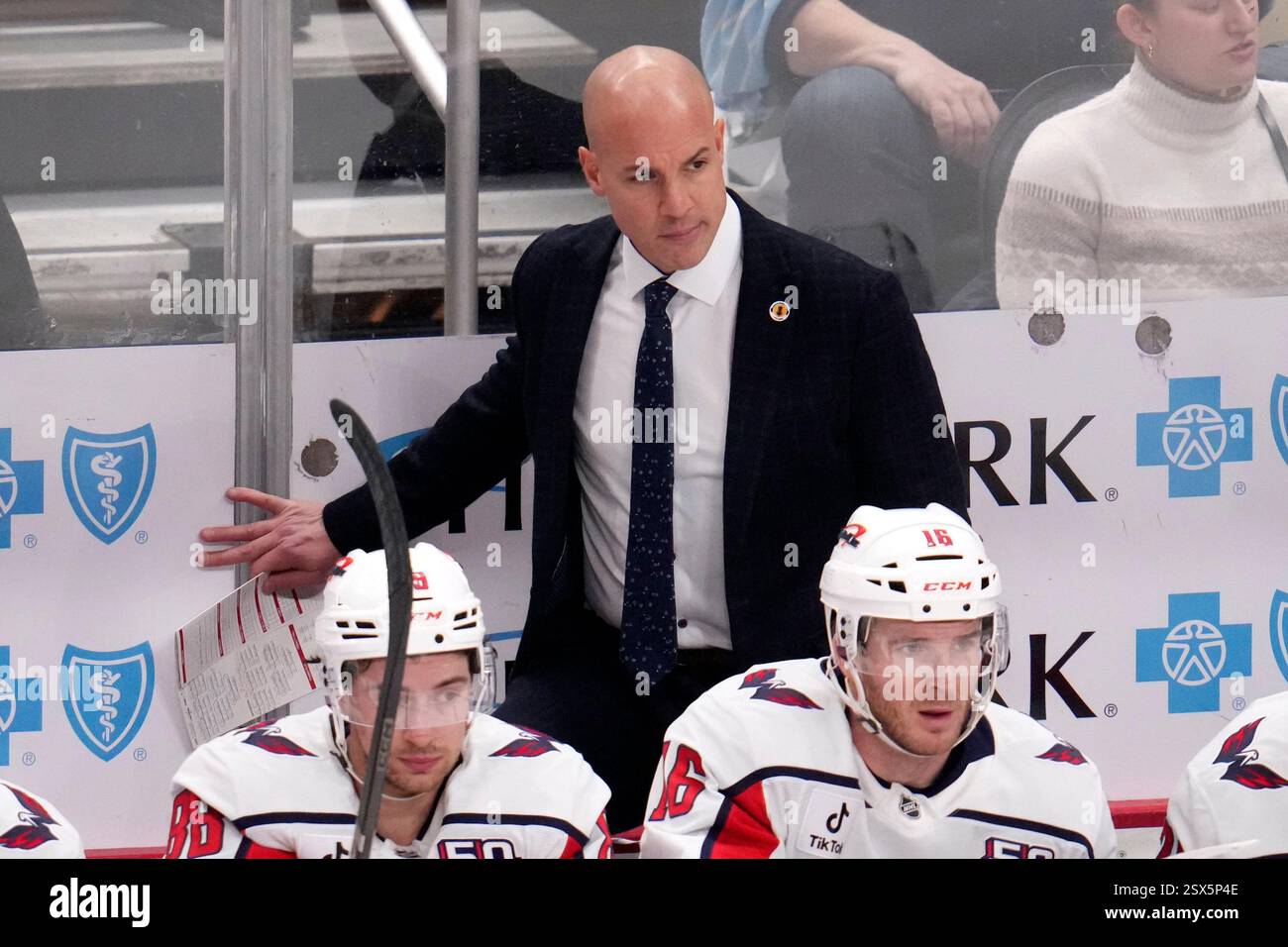 Washington Capitals head coach Spencer Carbery stands behind his bench ...