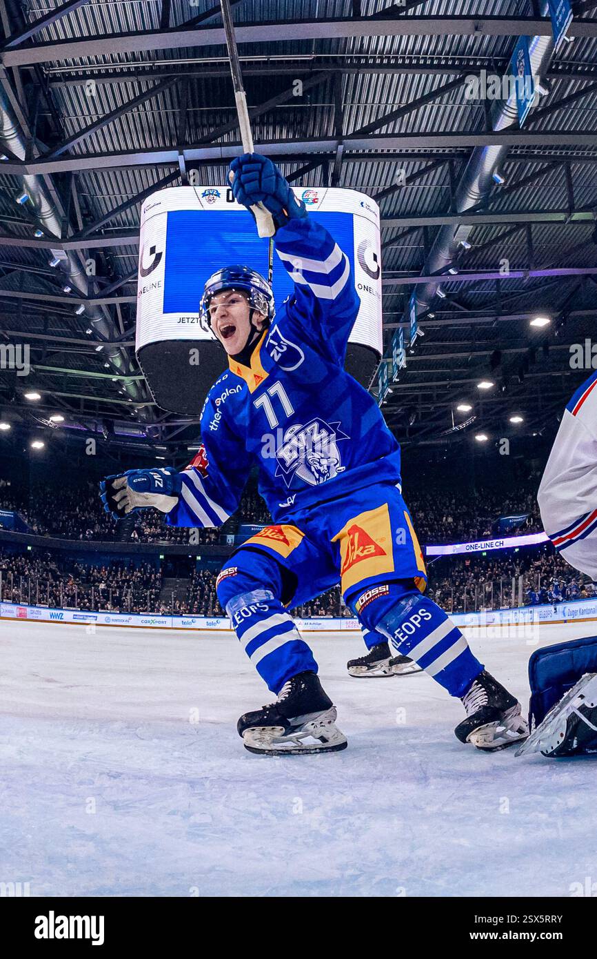 Loris Wey #77 (EV Zug) celebrates after Sven Leuenberger #61 (EV Zug ...