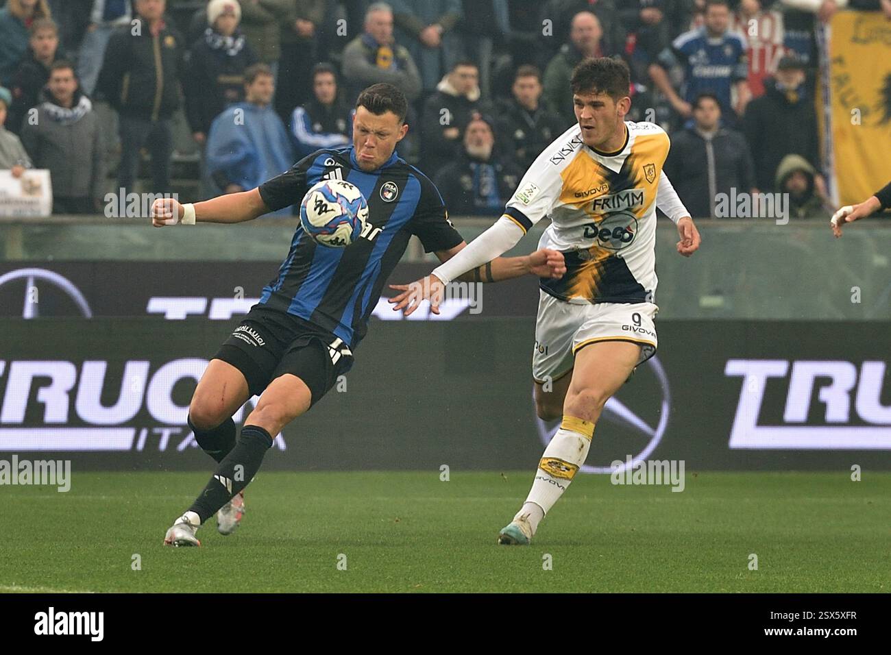 Pisa, Italy. 22nd Feb, 2025. Adrian Rus (Pisa) thwarted by Andrea ...