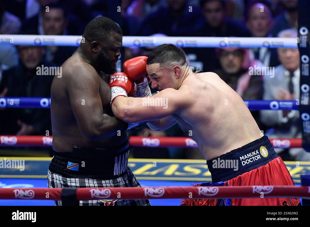 Joseph Parker, right, battles Martin Bakole during a the WBO interim ...