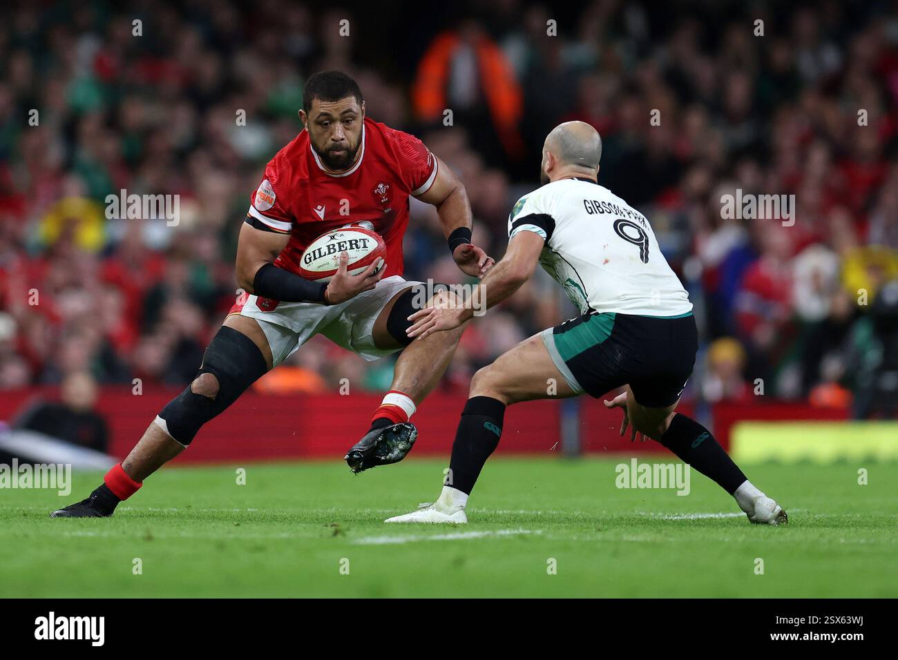 Taulupe Faletau of Wales in action (l). .Guinness Six Nations ...