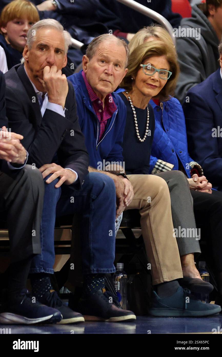 Former president George W Bush and his wife First Lady Laura Bush watch ...