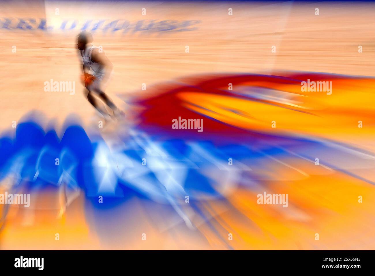 In this photo taken with a slow shutter speed, Kansas guard David Coit ...