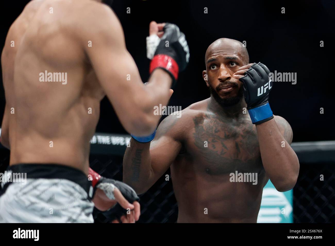 Seattle, Washington, USA. 22nd Feb, 2025. NURSULTON RUZIBOEV and ERIC ...