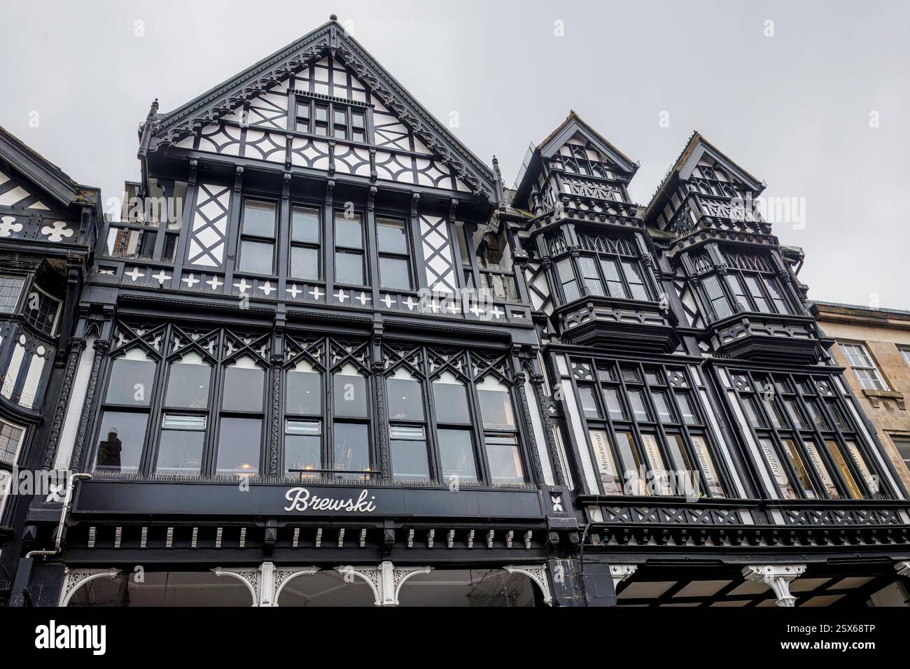 Two tier timbered building in Chester Stock Photo - Alamy