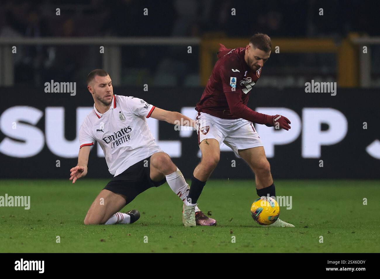 Turin, Italy. 22nd Feb, 2025. Strahinja Pavlovic of AC Milan challenges ...