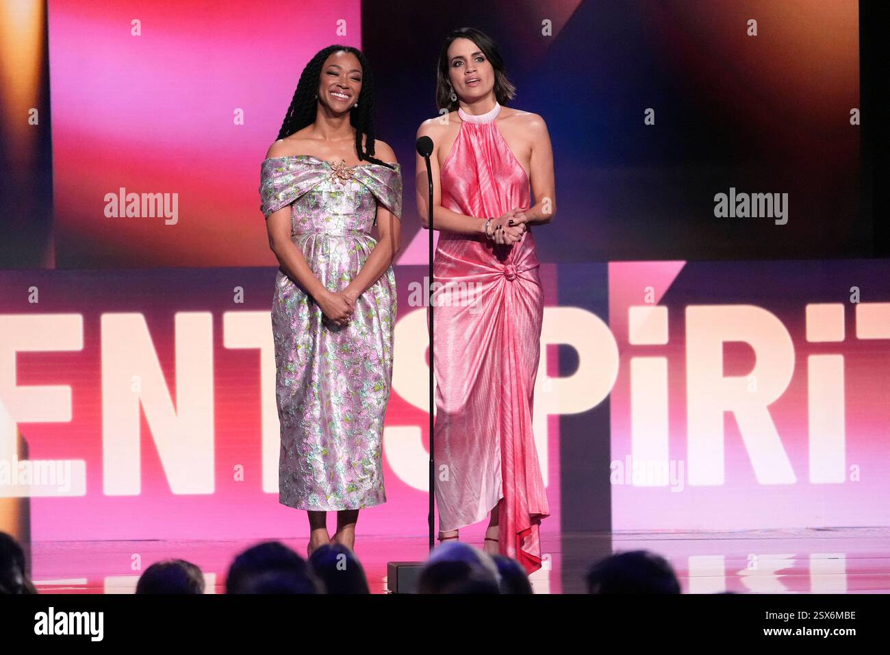Sonequa Martin-Green, left, and Natalie Morales present the award for best cinematography during ...