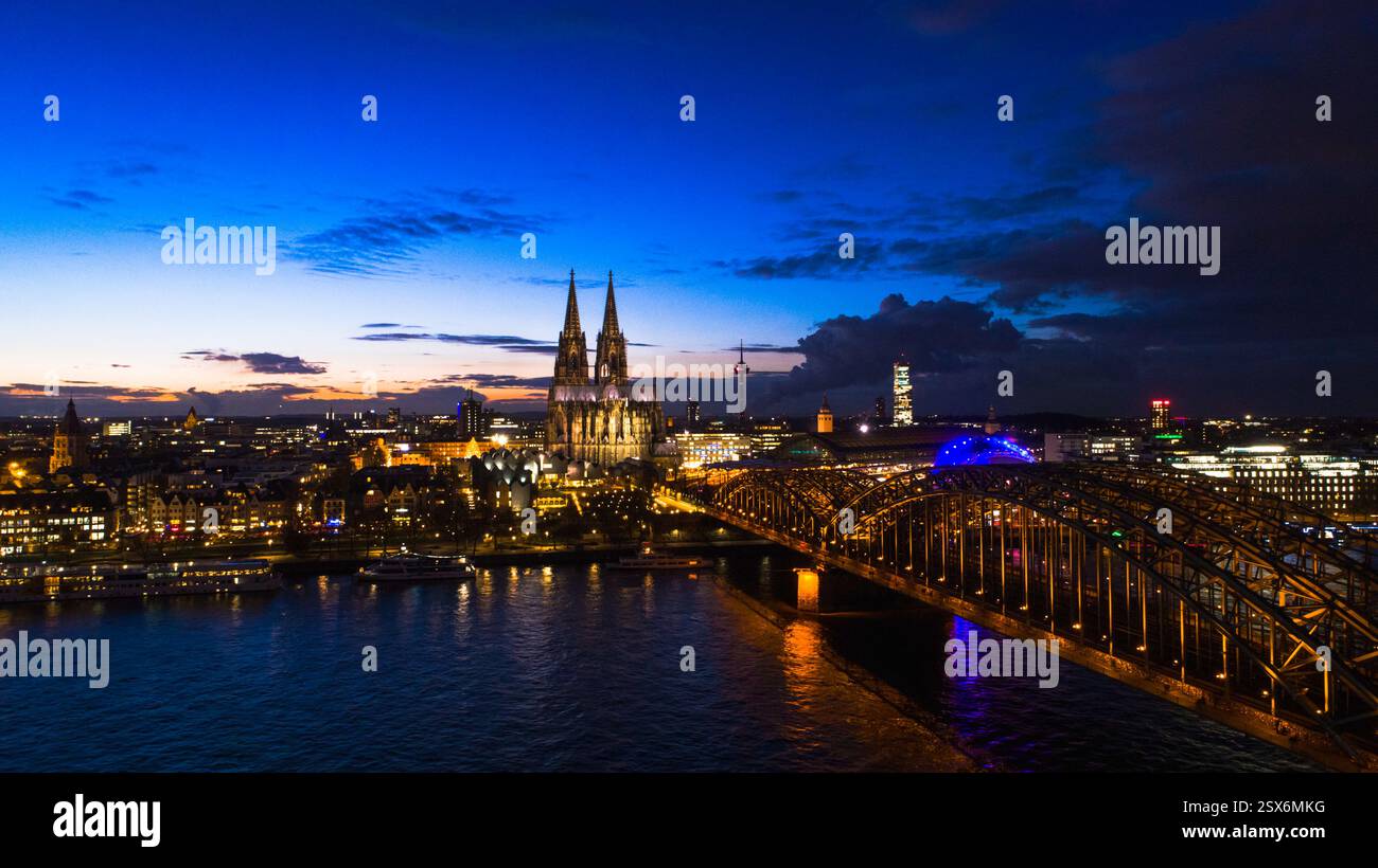 Night city skyline aerial view of Cologne in Germany from above right ...
