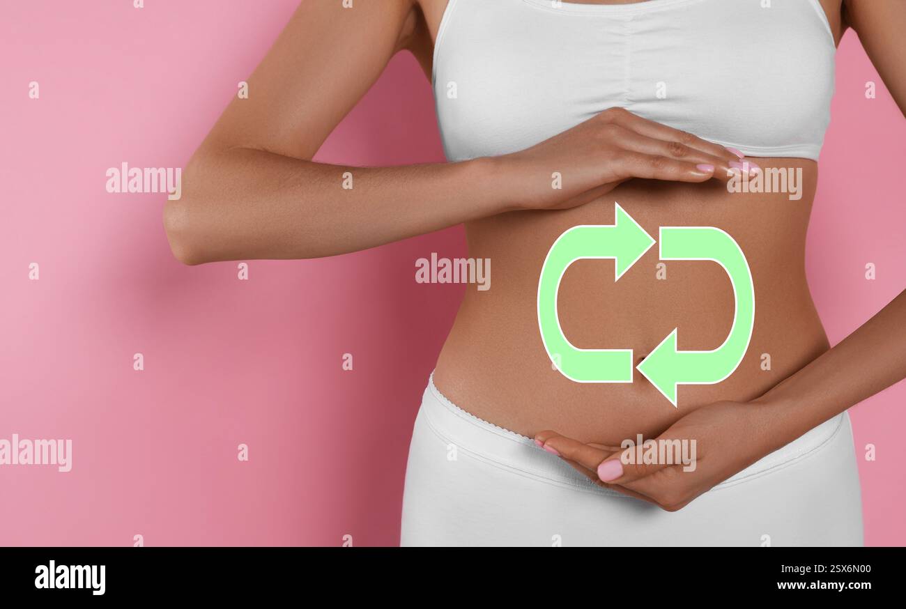 Woman with healthy digestion on pink background, closeup. Arrows ...