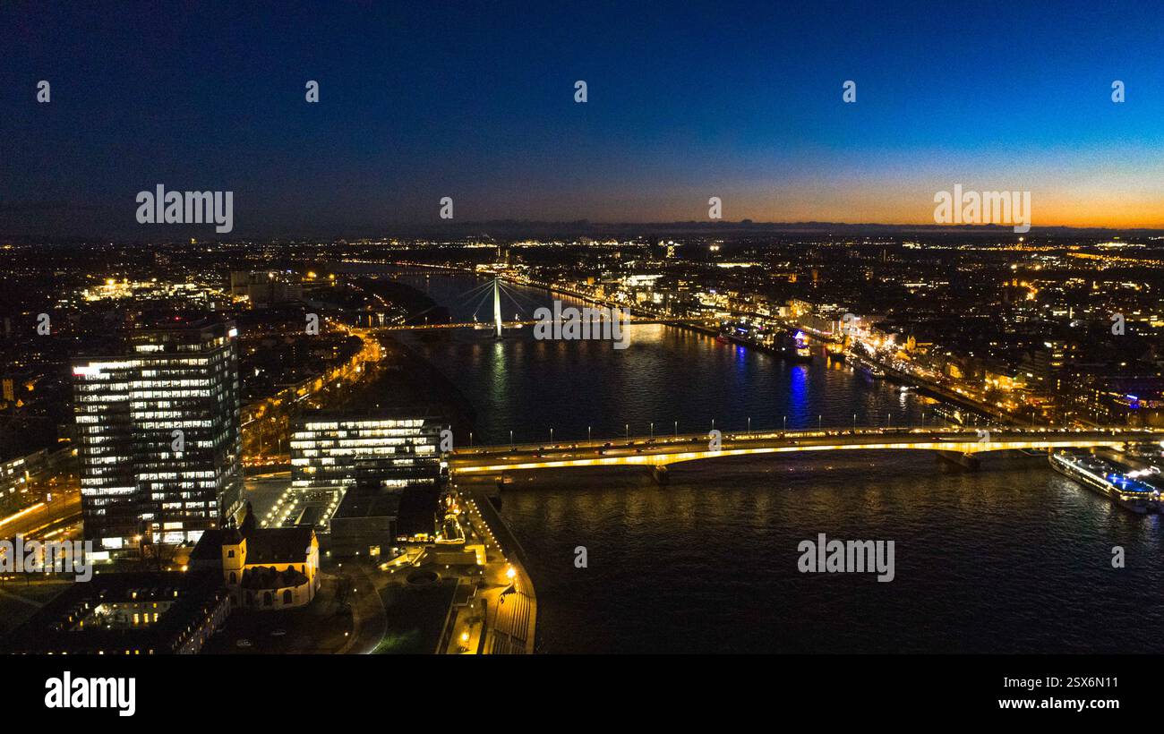 Night city skyline aerial view of Cologne in Germany from above right ...