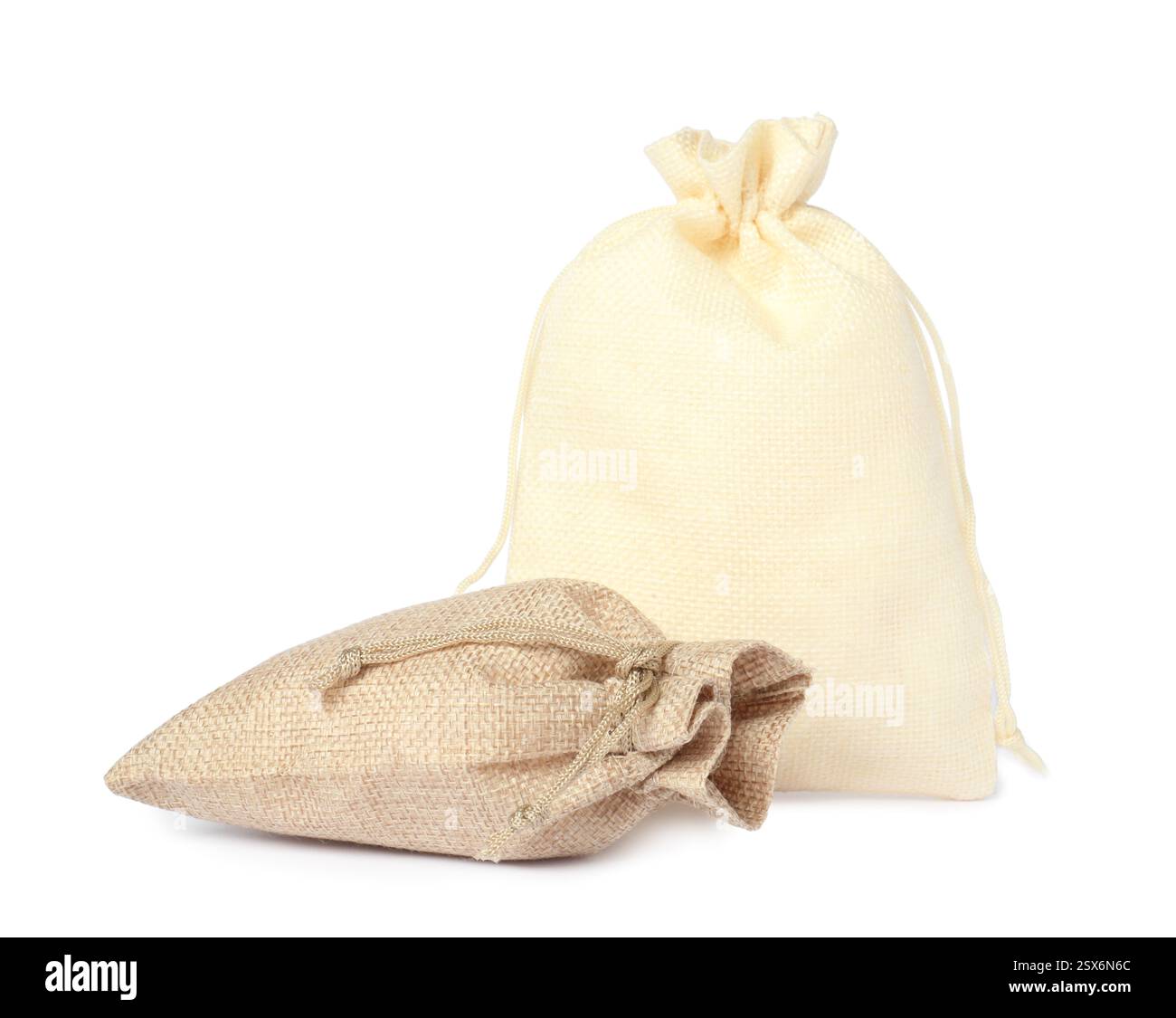 Two beige burlap sacks isolated on white Stock Photo - Alamy