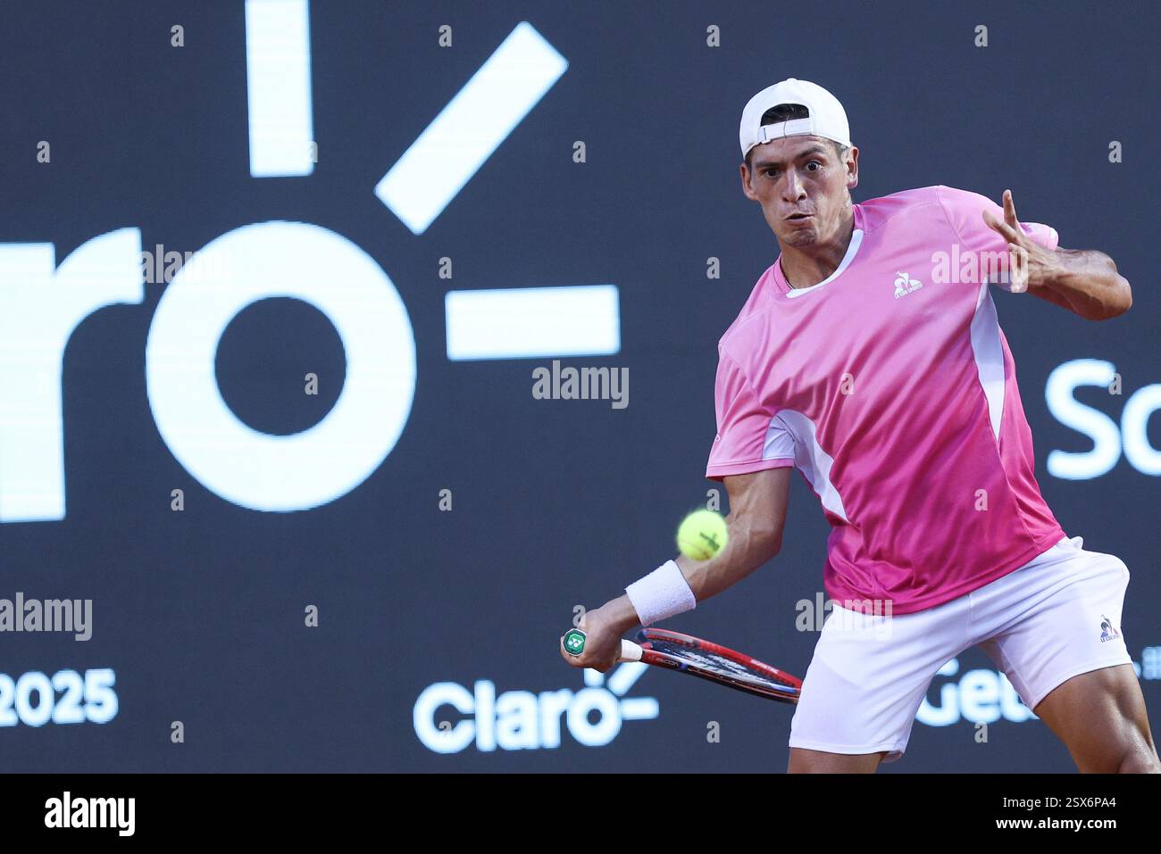 (250223) -- BRAZIL, Feb. 23, 2025 (Xinhua) -- Sebastian Baez of Argentina hits a return during ...