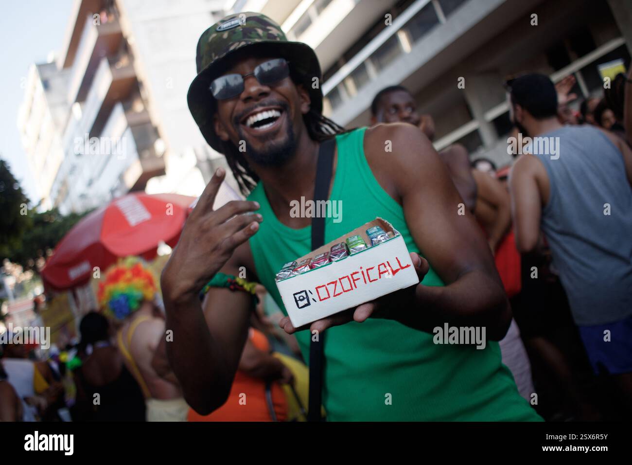 Rio De Janeiro, Brazil. 22nd Feb, 2025. A street vendor dances ...