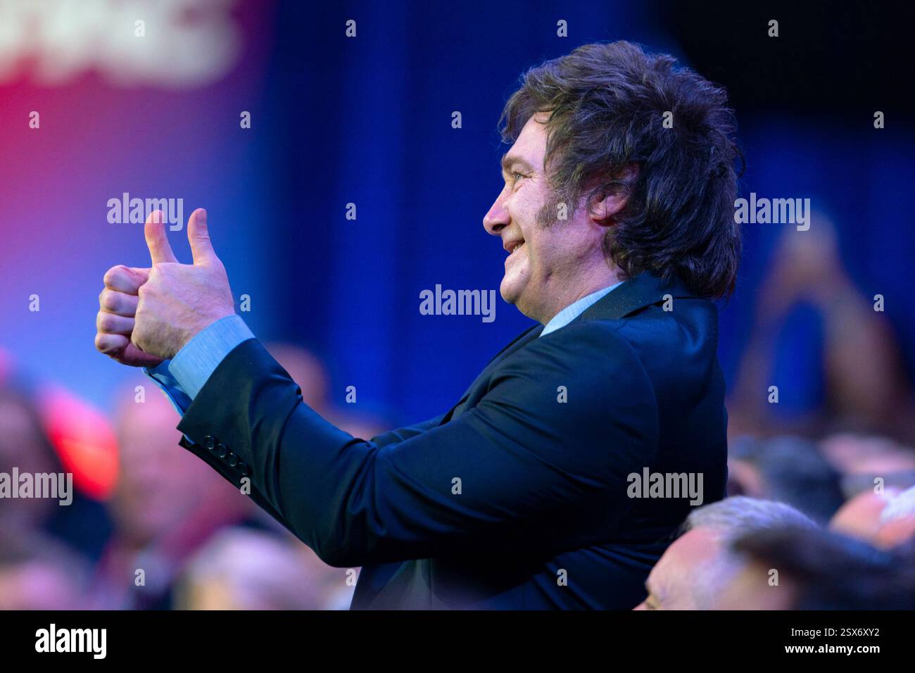 Argentina's President Javier Milei gives two thumbs up as he listens to President Donald Trump ...