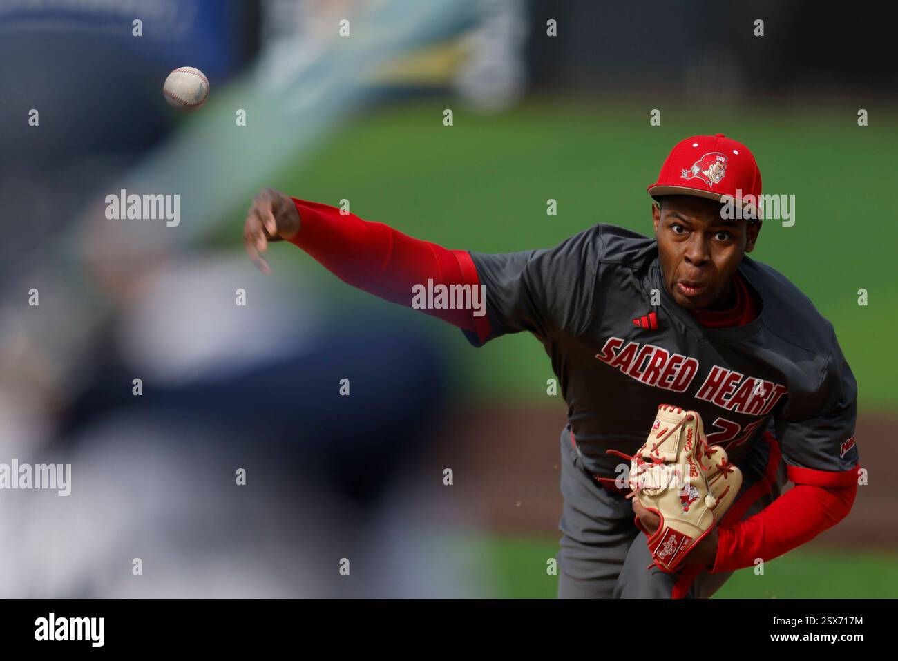 Sacred Heart pitcher Elijah Foster (22) throws to a Georgetown batter ...