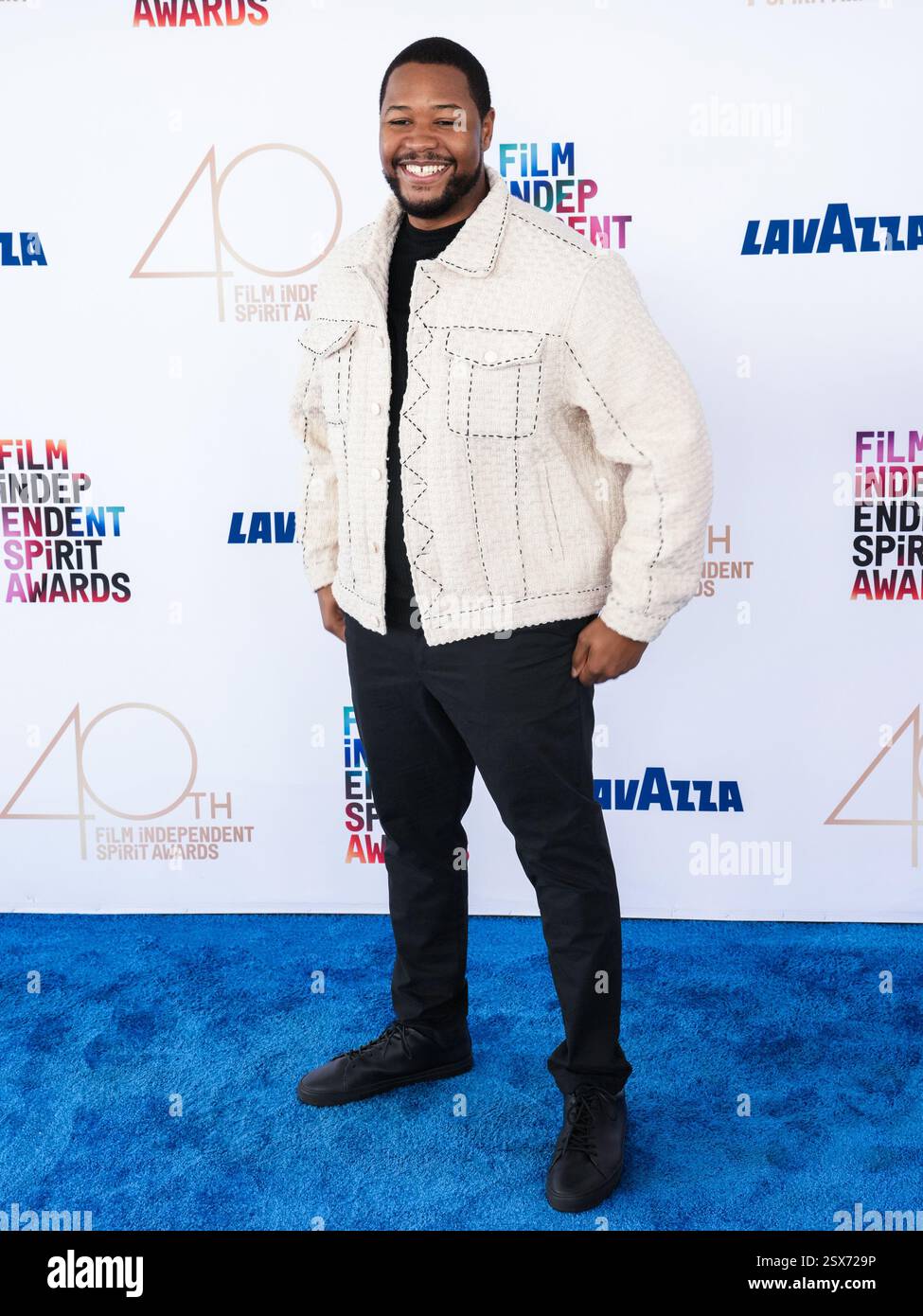 Los Angeles, USA. 22nd Feb, 2025. Luke Tennie walking on the red carpet ...