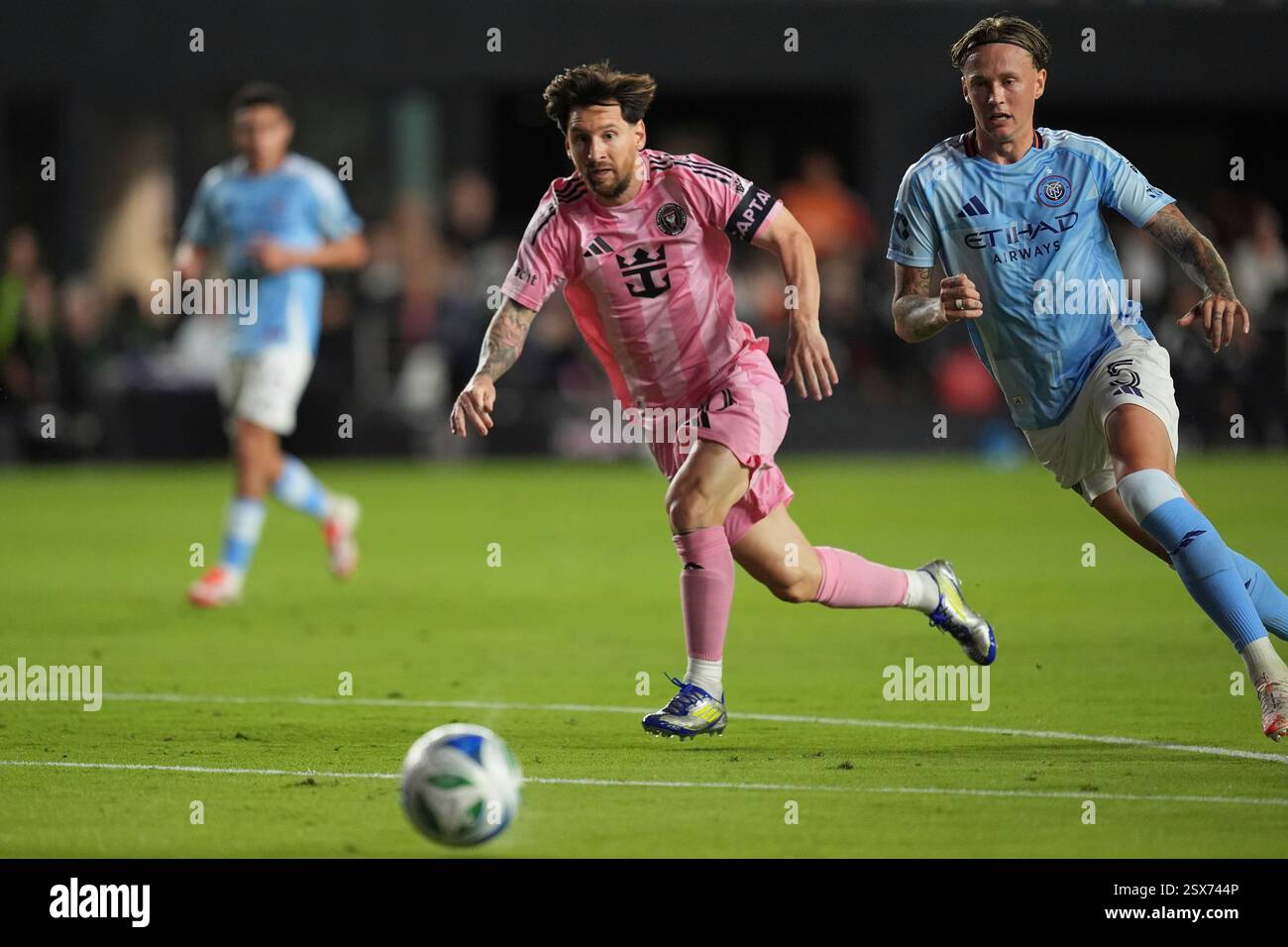 Inter Miami forward Lionel Messi, left, and New York City FC defender ...