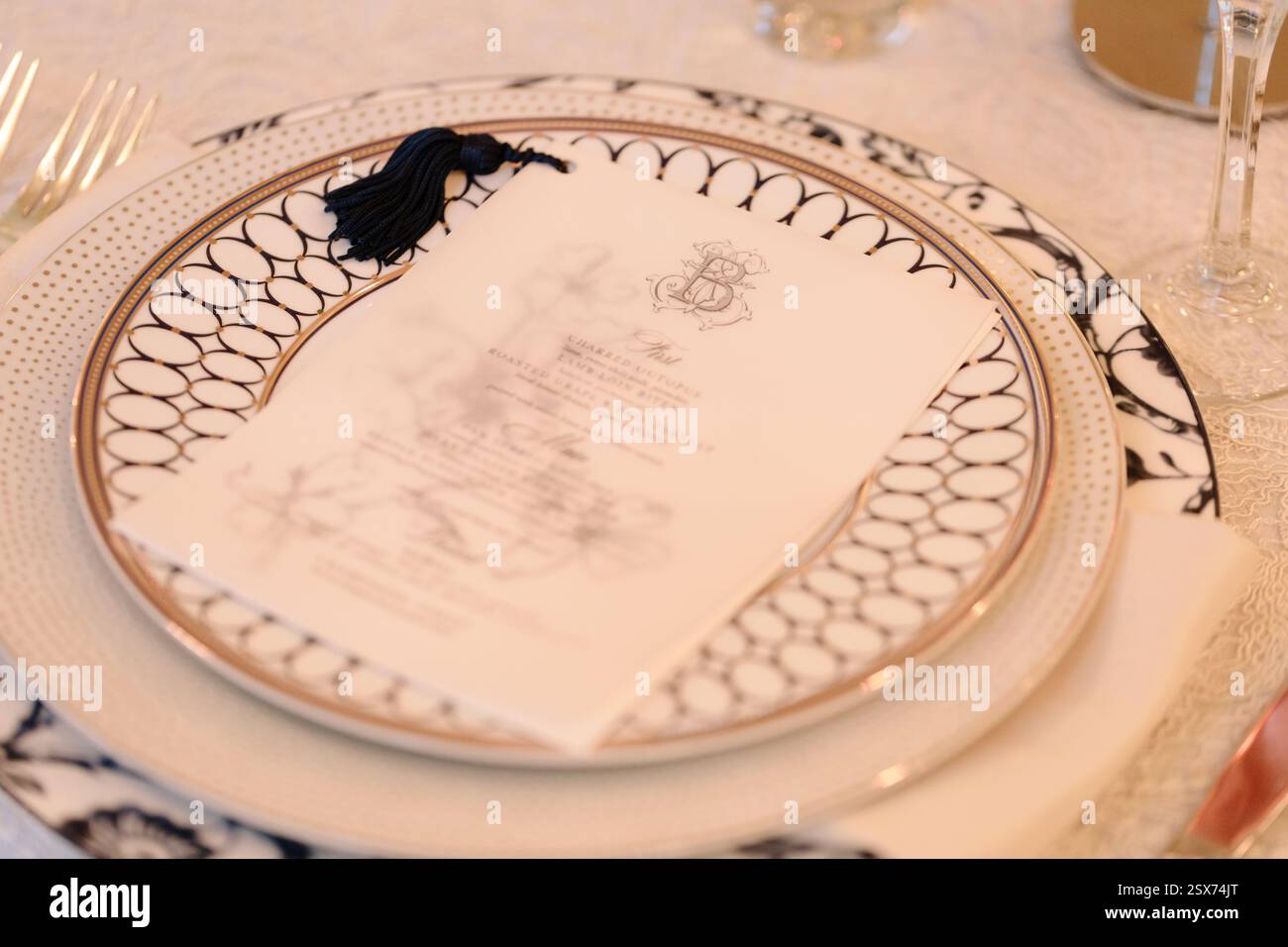 Exquisite table arrangement highlights a stylish menu placed on an ...