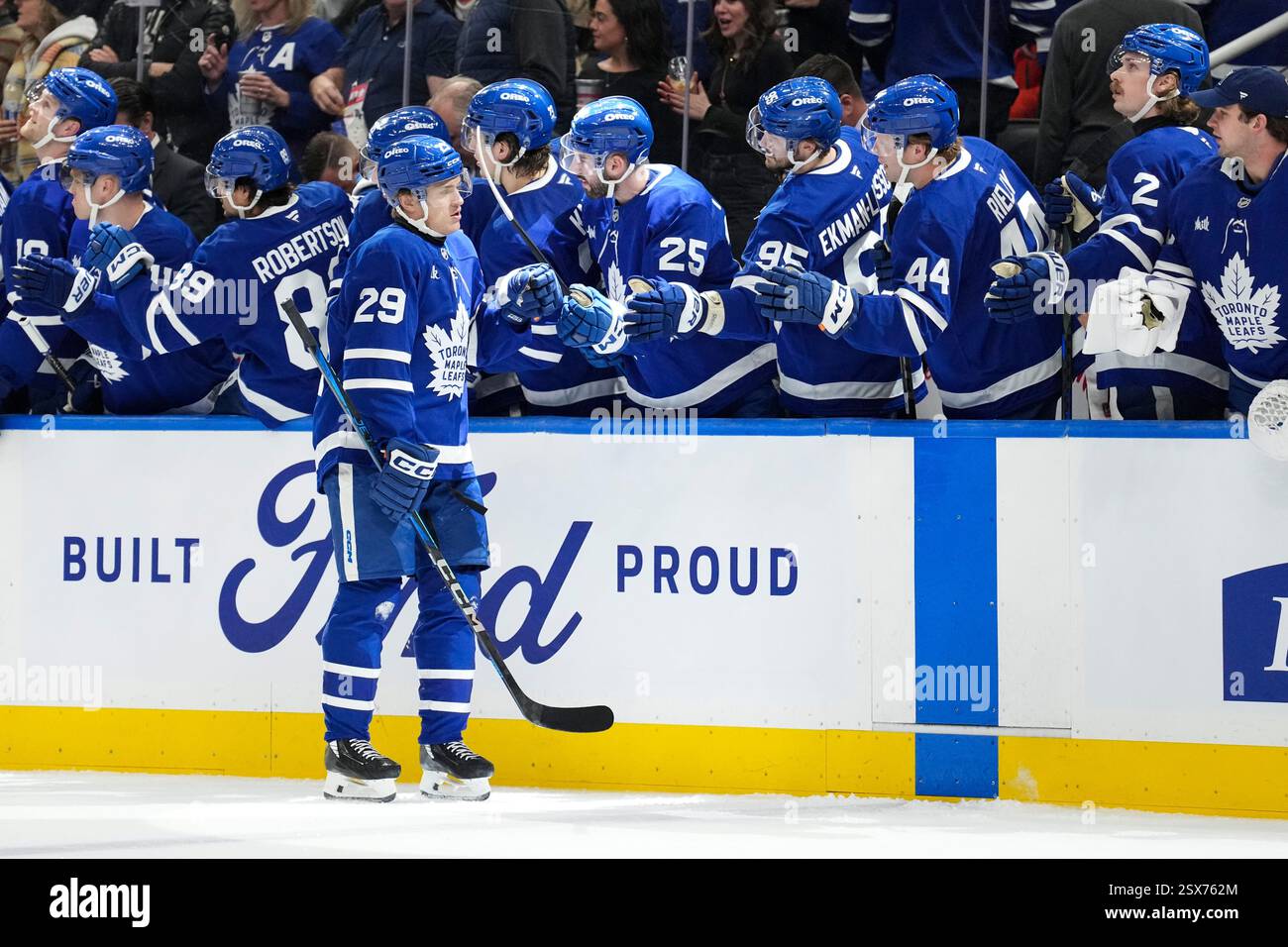 Toronto Maple Leafs right wing Pontus Holmberg (29) is congratulated by ...