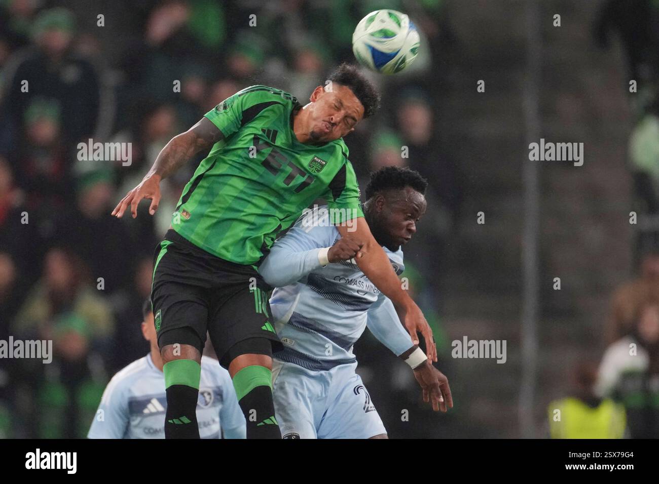 Austin FC defender Julio Cascante, left, and Sporting Kansas City ...