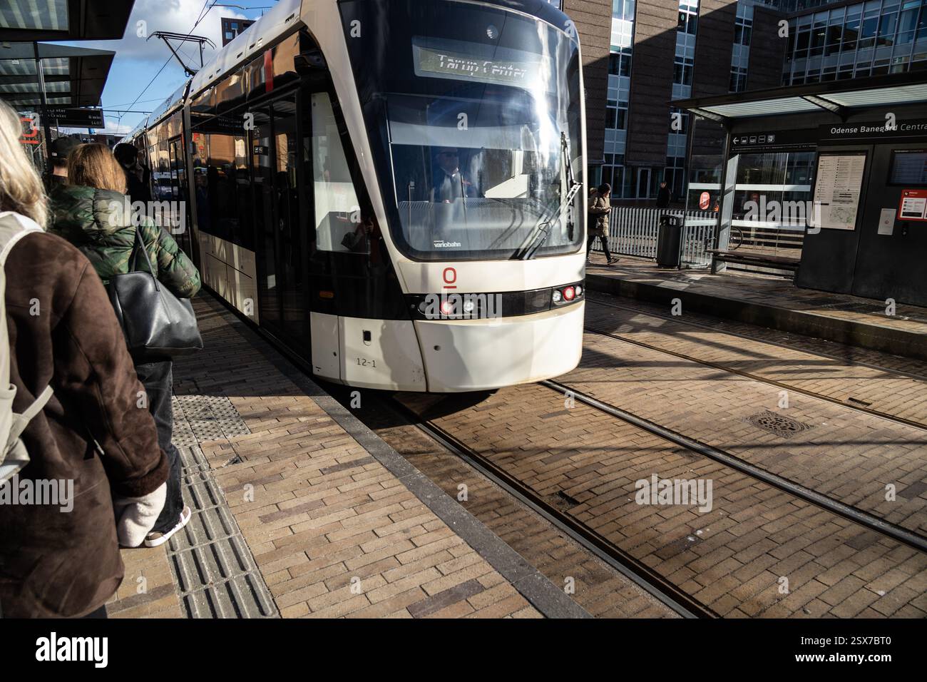 Passengers are seen at a station of Odense Banegård (Odense Letbane) a ...