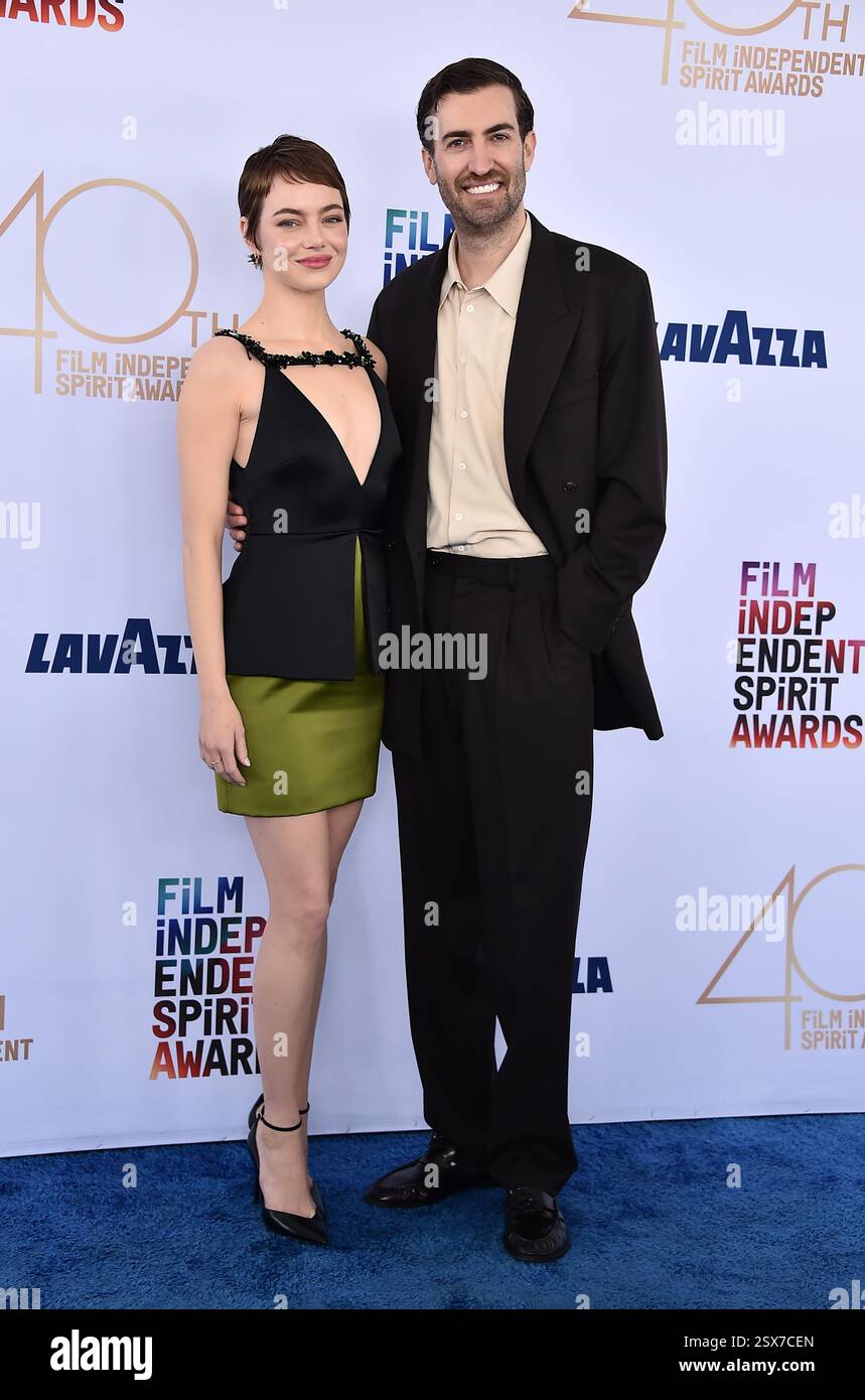 Santa Monica, USA. 22nd Feb, 2025. Emma Stone and Dave McCary arriving ...