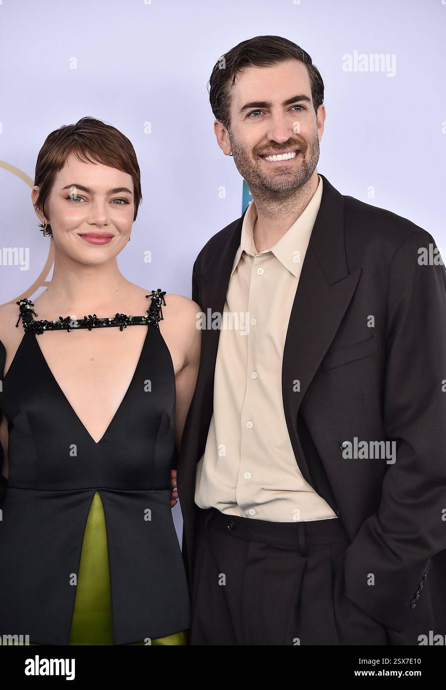 Santa Monica, USA. 22nd Feb, 2025. Emma Stone and Dave McCary arriving ...