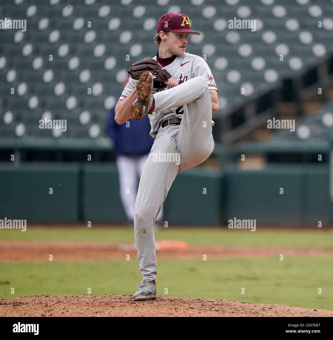 Minnesota Golden Gophers Pitcher Kyle Remington (20) throws a pitch ...